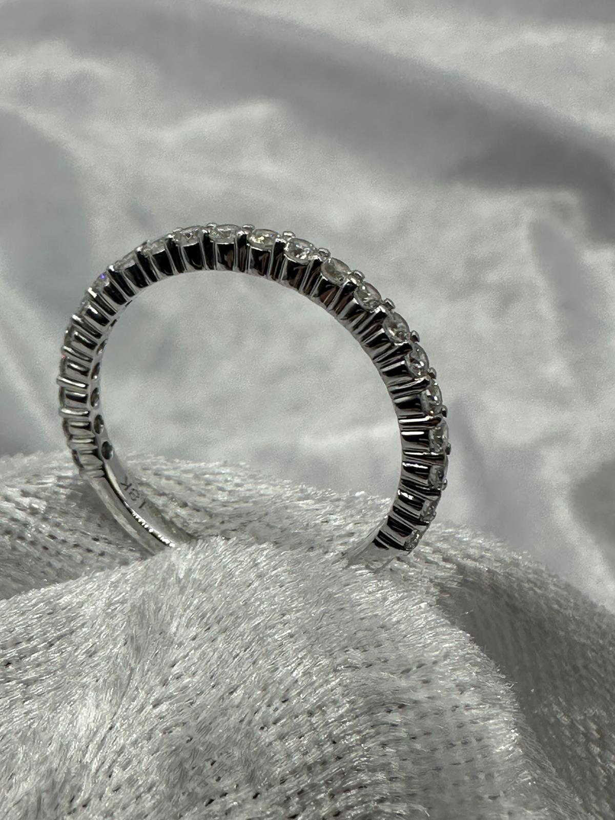 classic shared claw diamond ring in 18K whte gold. 0.66 TCW – Diamondstory