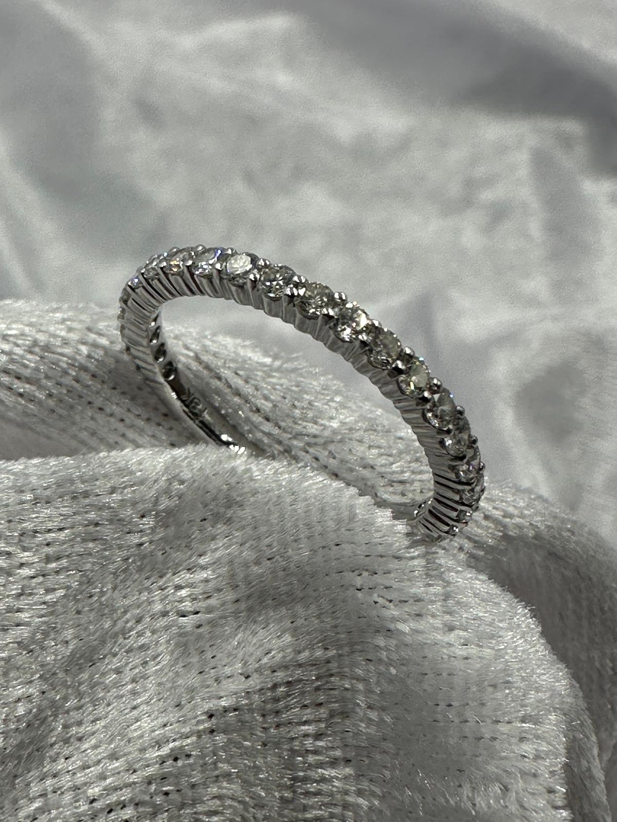 classic shared claw diamond ring in 18K whte gold. 0.66 TCW – Diamondstory