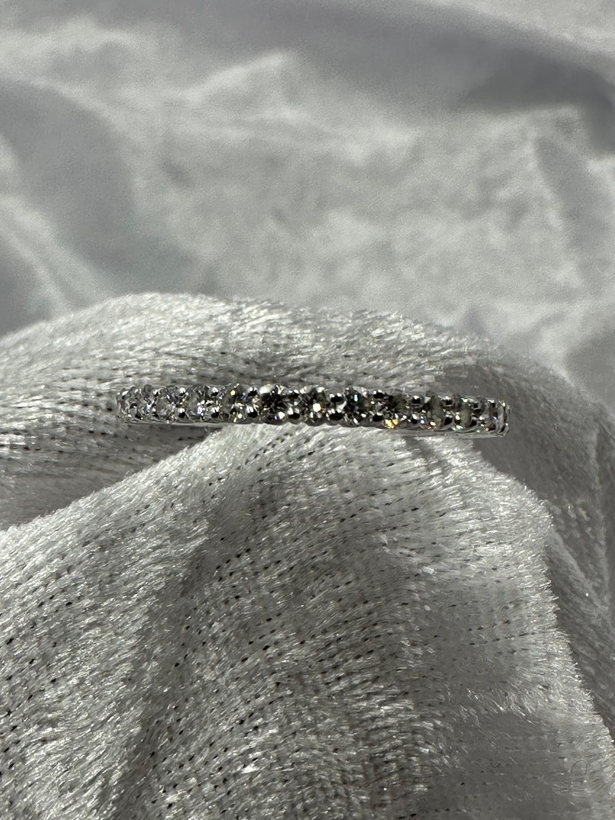 classic shared claw diamond ring in 18K whte gold. 0.66 TCW – Diamondstory